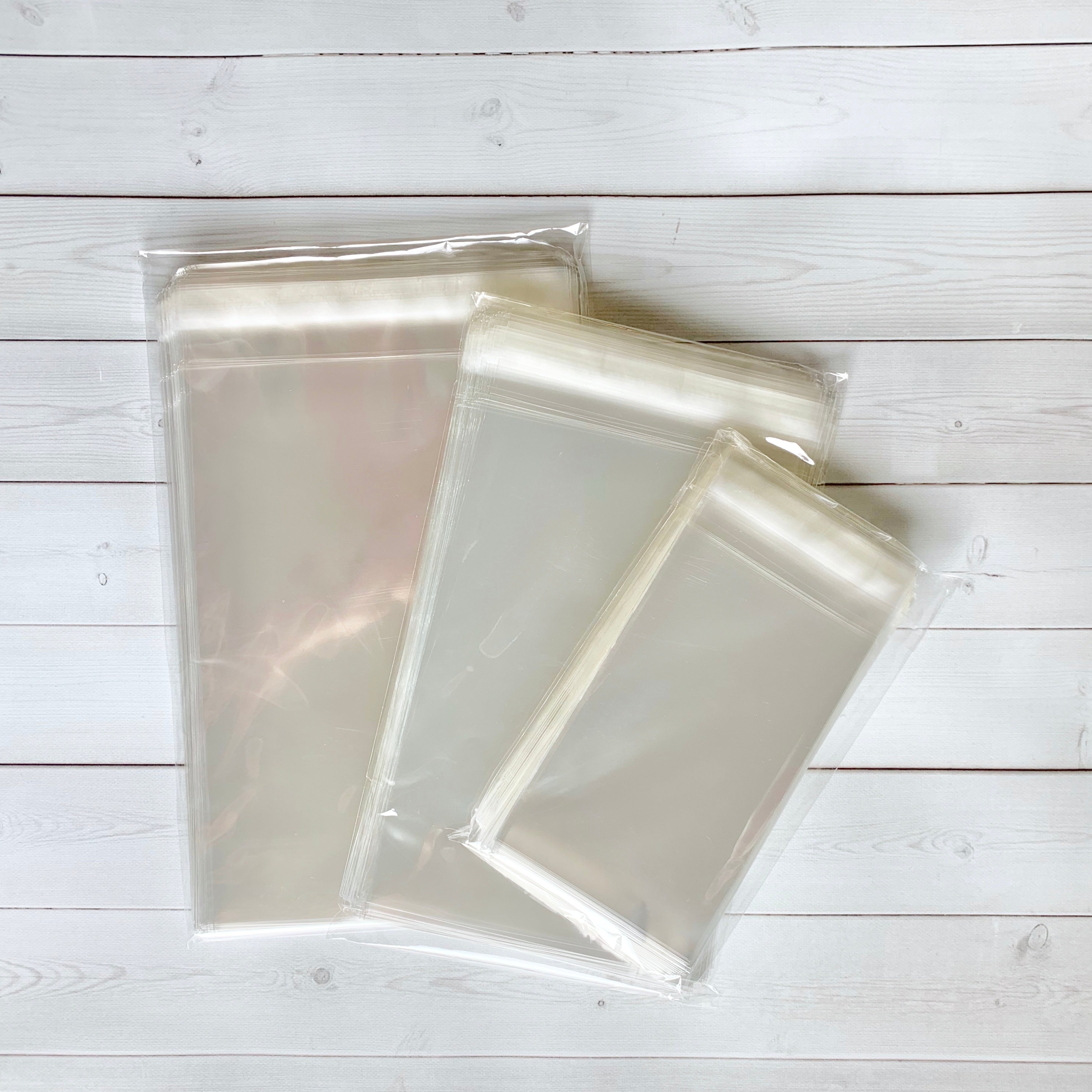 Clear cellophane bags. Flat and peel and stick. Perfect for sealing ...